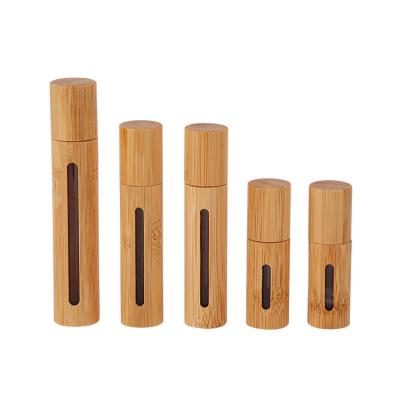 China All Inclusive Bamboo Roller Ball Bottles 3ml 5ml 10ml 15ml Portable Stainless Steel Roller Bottle for sale