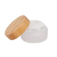 China 10ml 30ml 50ml 100ml 150ml 200ml 250ml Frosted Glass Cream Jar With Bamboo Lid for sale