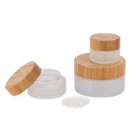 China 10ml 30ml 50ml 100ml 150ml 200ml 250ml Frosted Glass Cream Jar With Bamboo Lid for sale