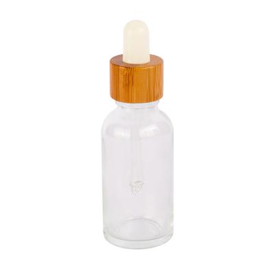 China Round Cosmetic Dropper Bottle Bamboo Glass Dropper Bottle 15ml 20ml 30ml 50ml 100ml for sale