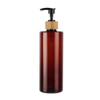 China 60ml 80ml 100ml 120ml 150ml 180ml 200ml 250ml 300ml Natural Elegant Amber Flat Shoulder PET Bottle With Natural Bamboo Lotion Pump for sale