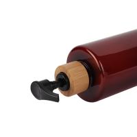 China 60ml 80ml 100ml 120ml 150ml 180ml 200ml 250ml 300ml Natural Elegant Amber Flat Shoulder PET Bottle With Natural Bamboo Lotion Pump for sale