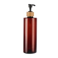 China 60ml 80ml 100ml 120ml 150ml 180ml 200ml 250ml 300ml Natural Elegant Amber Flat Shoulder PET Bottle With Natural Bamboo Lotion Pump for sale