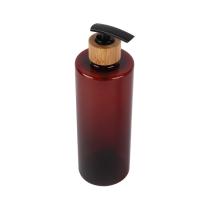 China 60ml 80ml 100ml 120ml 150ml 180ml 200ml 250ml 300ml Elegant Amber Flat Shoulder PET Bottle With Natural Bamboo Lotion Pump for sale