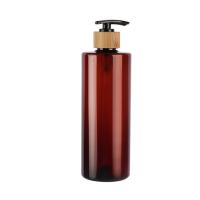 China 60ml 80ml 100ml 120ml 150ml 180ml 200ml 250ml 300ml Elegant Amber Flat Shoulder PET Bottle With Natural Bamboo Lotion Pump for sale
