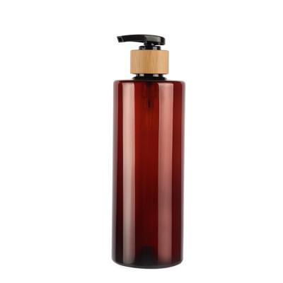 China 60ml 80ml 100ml 120ml 150ml 180ml 200ml 250ml 300ml Luxury And Elegant Amber Flat Shoulder PET Bottle With Natural Bamboo Lotion Pump for sale