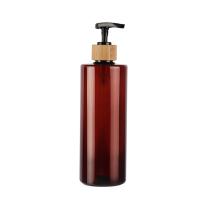 China 60ml 80ml 100ml 120ml 150ml 180ml 200ml 250ml 300ml Luxury And Elegant Amber Flat Shoulder PET Bottle With Natural Bamboo Lotion Pump for sale