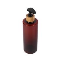 China 60ml 80ml 100ml 120ml 150ml 180ml 200ml 250ml 300ml Luxury And Elegant Amber Flat Shoulder PET Bottle With Natural Bamboo Lotion Pump for sale