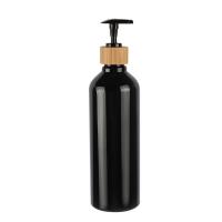 China Black Round Shoulder PET Cosmetic Lotion Bottle With Natural Bamboo Lotion Pump for sale