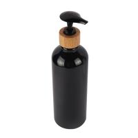 China Black Round Shoulder PET Cosmetic Lotion Bottle With Natural Bamboo Lotion Pump for sale