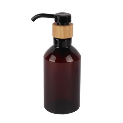 China Amber Slanted Shoulder PET Bottle Natural Bamboo Long Nozzle Lotion Pump 7oz 10oz 16oz for sale