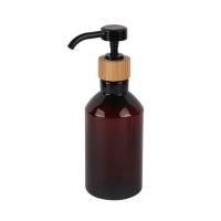 China Amber Slanted Shoulder PET Bottle Natural Bamboo Long Nozzle Lotion Pump 7oz 10oz 16oz for sale