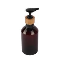 China 7oz 10oz 16oz Cosmetic Lotion Bottle Refillable Amber Slanted Shoulder PET Lotion Bottle for sale