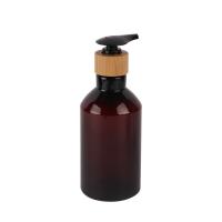 China 7oz 10oz 16oz Cosmetic Lotion Bottle Refillable Amber Slanted Shoulder PET Lotion Bottle for sale