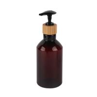 China 7oz 10oz 16oz Cosmetic Lotion Bottle Refillable Amber Slanted Shoulder PET Lotion Bottle for sale