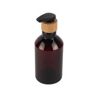 China 200ml 300ml 500ml Refillable Amber Bottles Slanted Shoulder PET Plastic Bottle For Lotion for sale