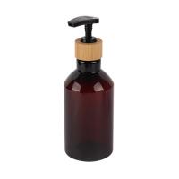 China 200ml 300ml 500ml Refillable Amber Bottles Slanted Shoulder PET Plastic Bottle For Lotion for sale