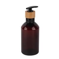 China 7oz 10oz 16oz Cosmetic Lotion Bottle Slanted Shoulder 200ml 300ml 500ml Amber PET Bottle for sale