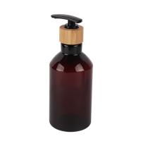 China 7oz 10oz 16oz Cosmetic Lotion Bottle Slanted Shoulder 200ml 300ml 500ml Amber PET Bottle for sale
