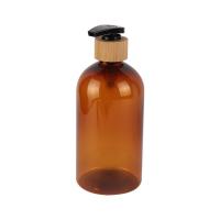 China Natural Bamboo Cosmetic Lotion Bottle Refillable 200ml 300ml 500ml Amber PET Bottle for sale