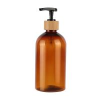 China Natural Bamboo Cosmetic Lotion Bottle Refillable 200ml 300ml 500ml Amber PET Bottle for sale