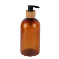 China 200ml 300ml 500ml Refillable Amber Lotion Bottle With Natural Bamboo Lotion Pump for sale