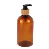 China 200ml 300ml 500ml Refillable Amber Lotion Bottle With Natural Bamboo Lotion Pump for sale