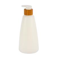China 200ml 300ml 500ml 7oz 10oz 16oz Refillable Conical HDPE Lotion Bottle With Natural Bamboo for sale