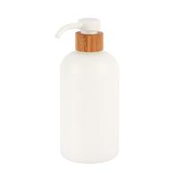 China Natural Bamboo Long Nozzle Lotion Pump 200ml 250ml 300ml 500ml Round Shoulder HDPE Bottle for sale