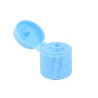 China 24/410 Striped Plastic Butterfly Flip Top Cap Matte Blue Skin Lotion Bottle Cap for sale
