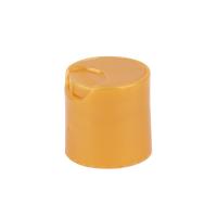 China Golden Yellow Smooth Disc Top Cap Press Type PP Plastic Flip Top Caps For Cream for sale