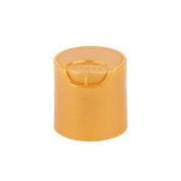 China Golden Yellow Smooth Disc Top Cap Press Type PP Plastic Flip Top Caps For Cream for sale
