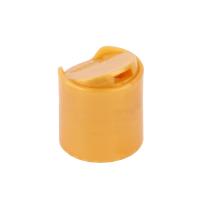 China Golden Yellow Smooth Disc Top Cap Press Type PP Plastic Flip Top Caps For Cream for sale