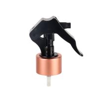 China 24/410 Black Plastic Mini Fine Mist Trigger Sprayer Rose Gold Aluminum Capped for sale