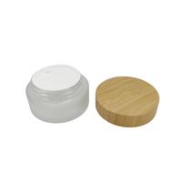 China 30g 50g Frosted Glass Cosmetic Jars With Bamboo Lids Luxury Face Cream Container for sale