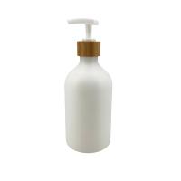 China 500ml Flat Headed Cosmetic Lotion Bottle 16 Ounce Plastic Bottle Pump Dispenser for sale