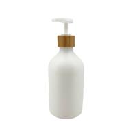 China 500ml Flat Headed Cosmetic Lotion Bottle 16 Ounce Plastic Bottle Pump Dispenser for sale