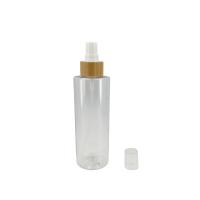 China Round Flat Shoulder Transparent Plastic Perfume Spray Bottles With Bamboo Lids 100ml 120ml for sale