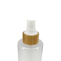 China Round Flat Shoulder Transparent Plastic Perfume Spray Bottles With Bamboo Lids 100ml 120ml for sale
