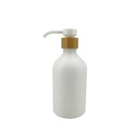 China Plastic 500ml Lotion Dispenser Bottle White Matte Round Tube Spiral Lotion Bottle for sale