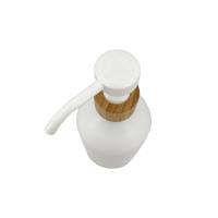 China Plastic 500ml Lotion Dispenser Bottle White Matte Round Tube Spiral Lotion Bottle for sale