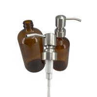 China Luxury 8oz 16oz Glass Clear Amber Boston Round Pump Bottles For Hand Lotion Shampoo for sale