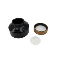 China Black Glass Cosmetic Cream Jar With Bamboo Lid 30ml 50ml Facial Cream Containers for sale