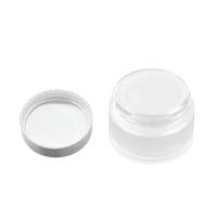 China Round 20g Cosmetic Cream Jar Transparent Frosted Glass Cream Jar With Silver Plastic Lid for sale