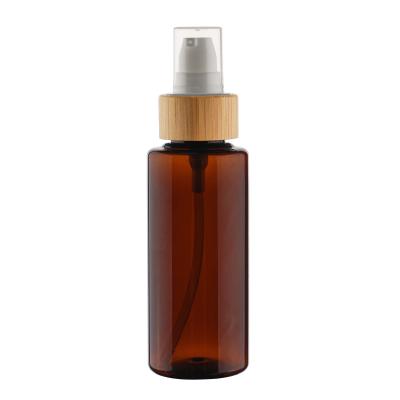 China Eco-friendly 100ml Amber Plastic Empty Cosmetic Packaging – 24/410 Lotion Bottle With Bamboo Lid for sale