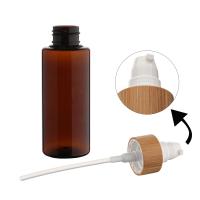 China Eco-friendly 100ml Amber Plastic Empty Cosmetic Packaging – 24/410 Lotion Bottle With Bamboo Lid for sale