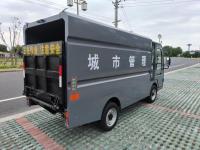 China Four Wheel Closed Barge Truck Garbage Transport Truck Sanitation Truck New Energy Electric for sale