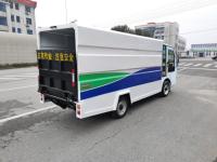 China Four Wheel Closed Barge Truck Garbage Transport Truck Sanitation Truck New Energy Electric for sale