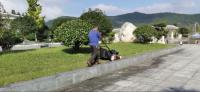 China Hand Pushed Fuel Garden Lawn Mower Machine For Grass Cutting for sale