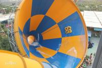 China Customized FRP Boomerang Spiral Swimming Pool Slide environmental protection for sale